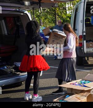 Members of the Jewish community in Watford prepare to deliver items, to ...