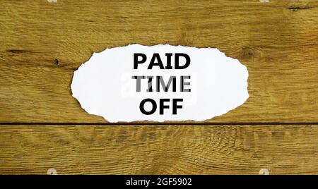 Paid time off symbol. Words 'Paid time off' on white note on beautiful ...