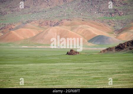 Mongolian mountain natural landscapes with eroded foothill slopes near ...