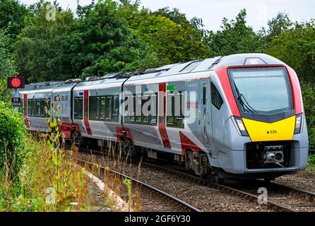 British Rail Class 755 Stadler bi-modal train arriving at railway station Ipswich, Suffolk ...