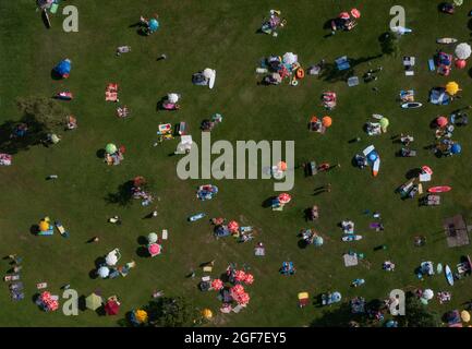 Drone shot, bathing place with colourful sunshades at the Irrsee, Zell ...