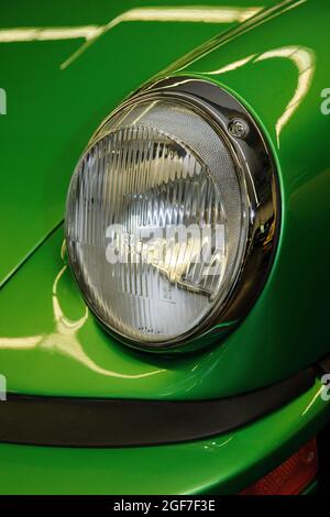 Headlamp of the sports car Porsche 911 Turbo S, 2016. Black and white ...