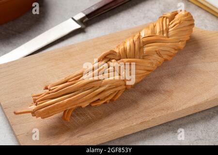 Smoked braided cheese close-up Stock Photo - Alamy