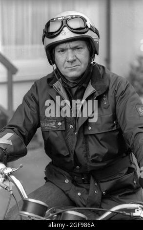 Actor Michael Elphick on a motorcycle as part of his character for the ...