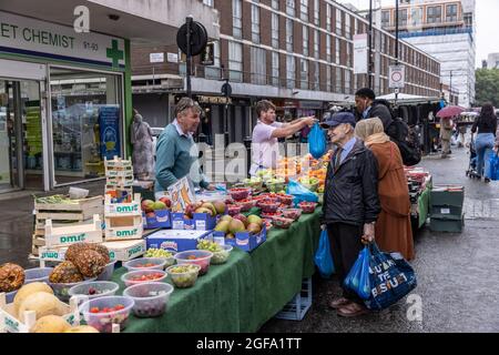 Londoner's shopping at the traditional Church Street Market established ...