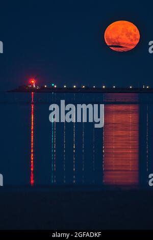 August sunset at Dún Laoghaire Lighthouse Stock Photo - Alamy