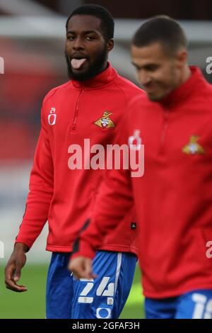 Cameron John of Doncaster Rovers in action with Sunderland's Max Power ...
