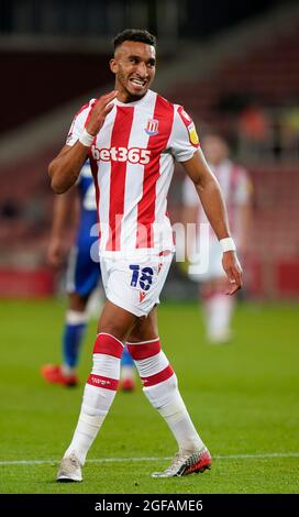Stoke, UK. 24th Aug, 2021. Thomas Ince of Stoke City (L) vies with Ed ...