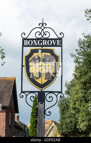Boxgrove Village sign with pictures of landmarks in the village, West ...