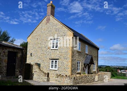 Stone cottage in Yetminster High Street in Dorset UK Stock Photo - Alamy