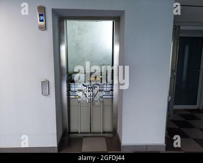 Elevator under maintenance. Broken elevator in open lift shaft. Out of ...