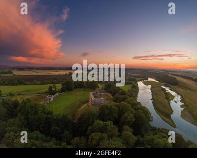 Norham Castle on the frontier with Scotland sitting on a rocky outcrop ...