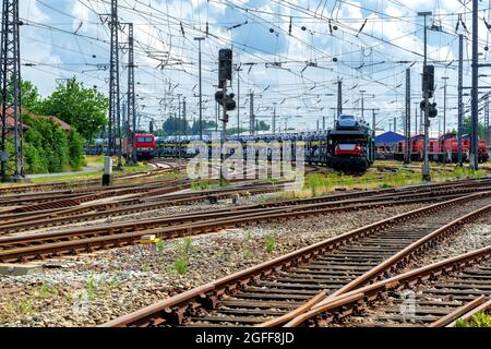Railroad car at a station carrying a load of firewood , Railroad cars ...