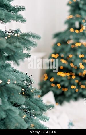light christmas tree background. Selective focus. Holiday Stock Photo ...