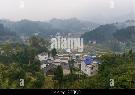 Beautiful misty scenery atop mountains in Hunan, China Stock Photo - Alamy