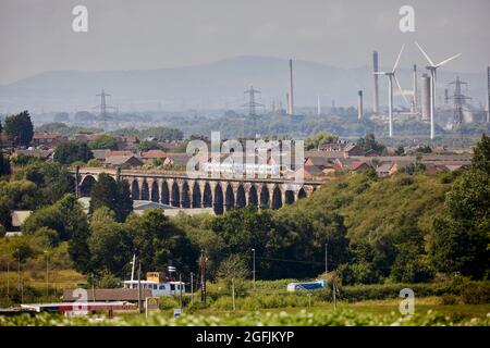 Train crosses Frodsham viaduct at Frodsham, Cheshire. And Frodsham Wind ...