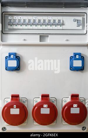 Industrial sockets on distribution board. Construction site electricity, temporary energy supply ...