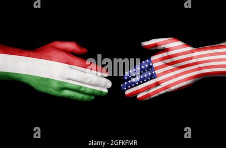 Country handshaking, consensus concept with Hungary and Ukraine flags ...