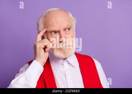 Photo of serious old minded man look empty space hold hand chin ...