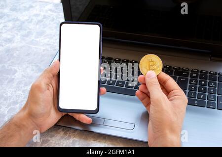 Man using a laptop with blockchain concept on the screen Stock Photo ...