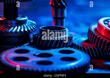 Gears. Machine part. Neon color Stock Photo - Alamy