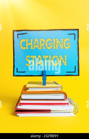 Sign displaying Charging Station, Concept meaning places where showing ...