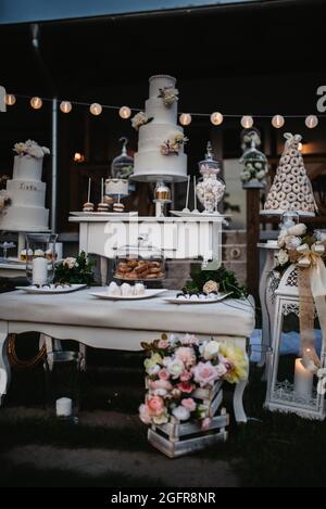Corner with cakes and desserts for the wedding ceremony Stock Photo - Alamy