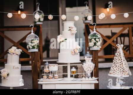 Corner with cakes and desserts for the wedding ceremony Stock Photo - Alamy