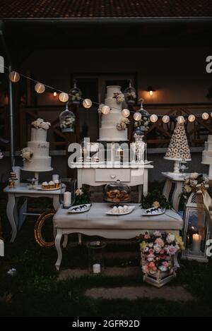 Corner with cakes and desserts for the wedding ceremony Stock Photo - Alamy