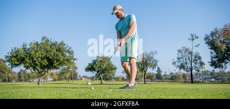 full length portrait of golfer in cap with golf club, sport Stock Photo ...