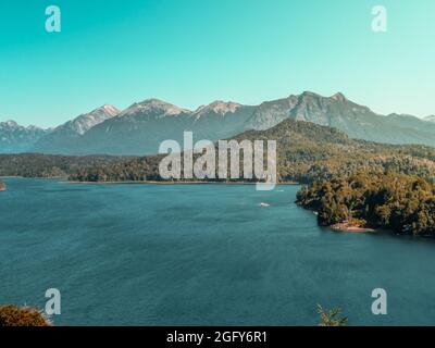 Beautiful view of the Moreno lake with coastal forest and high ...