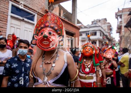 2nd August 2021. Bhaktapur, Nepal. A traditional masked dancer performs ...