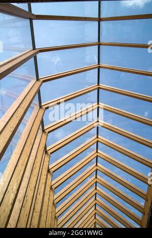 Modern cover made of laminated beams and glass plates Stock Photo - Alamy