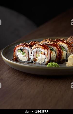Baked sushi roll Canada with salmon, cream cheese Stock Photo - Alamy