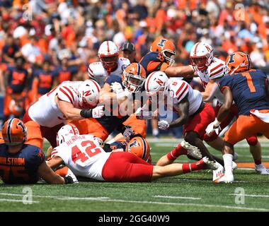 Illinois running back Mike Epstein, left, celebrates with Caleb Reams ...