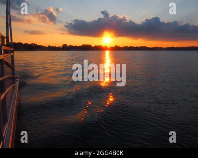 August Lake Sunset from a Pontoon Stock Photo - Alamy