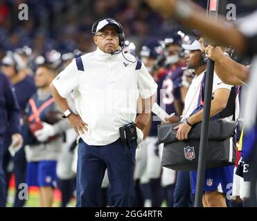 Houston Texans head coach David Culley (left) talks with Cleveland ...