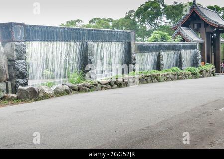 Waterfall at Guan Dao Guan Ying Temple, a Buddhist temple in New Taipei ...