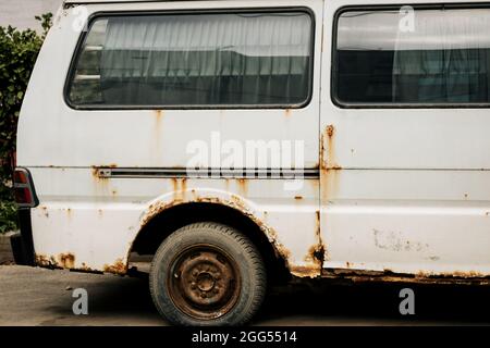 Broken minibus stands on road after an acciden Stock Photo - Alamy