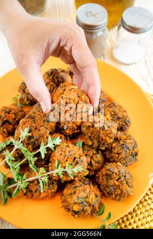 Falafel prepared with carrots and various spices Stock Photo - Alamy
