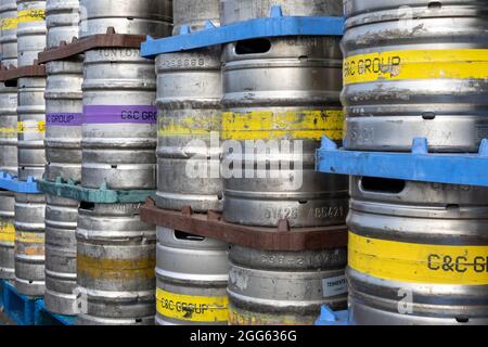 Aluminium beer, lager and cider barrels stacked outside a pub, Scotland ...