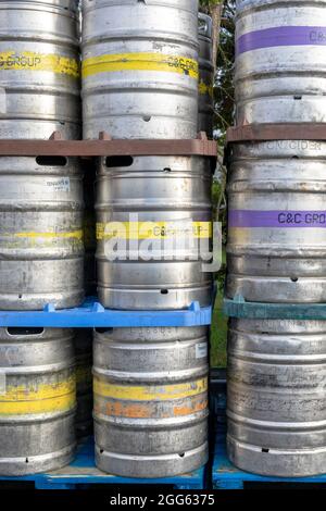 Aluminium beer, lager and cider barrels stacked outside a pub, Scotland ...