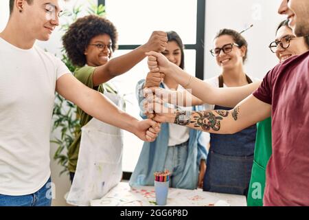 Group of draw students smiling happy drawing at art studio Stock Photo ...