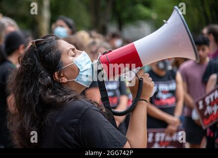 Protesters in Lafayette Square call for the protection and evacuation ...