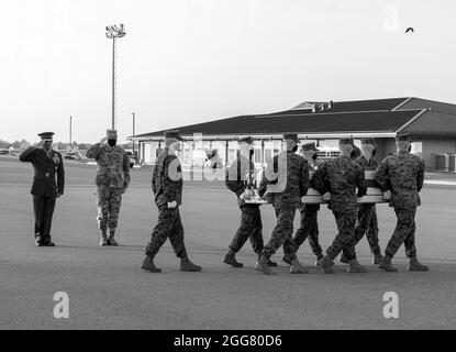 A U.S. Marine with Marine Corps Embassy Security Group (MCESG) sights ...
