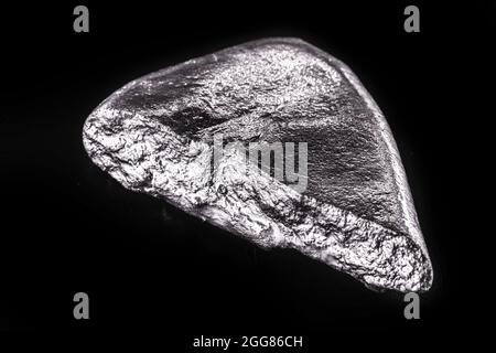 Rhodium nugget, chemical element with Rh symbol, metal for industrial ...