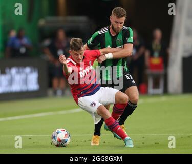 FC Dallas forward Szabolcs Schon (11) stumbles next to LA Galaxy ...