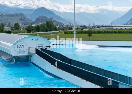 Surf wave pool in Switzerland. Alaia bay and Wave Garden in Sion ...