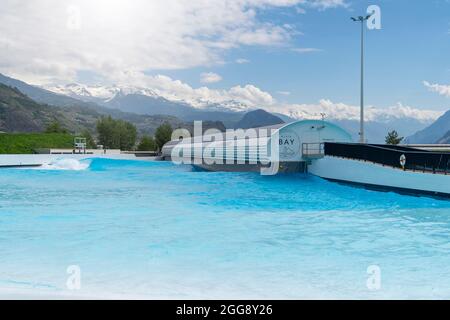 Surf wave pool in Switzerland. Alaia bay and Wave Garden in Sion ...