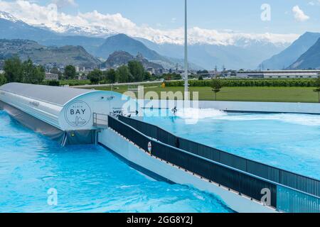 Surf wave pool in Switzerland. Alaia bay and Wave Garden in Sion ...